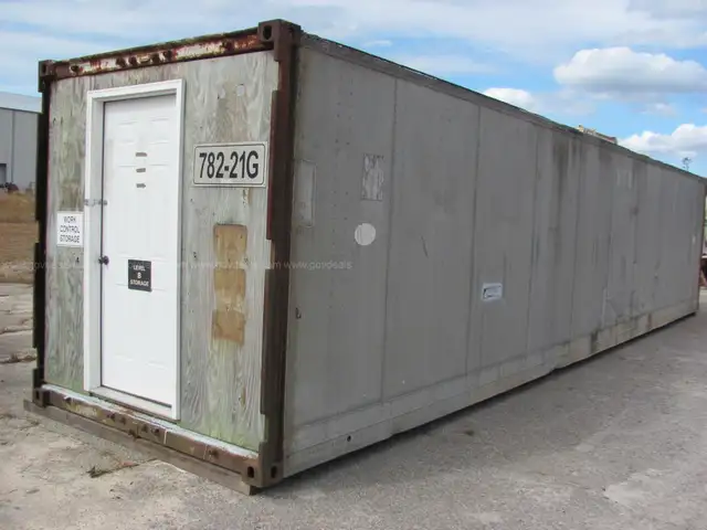 40' Sealand Container, Aluminum Skin, Steel Frame with Shelves | AllSurplus
