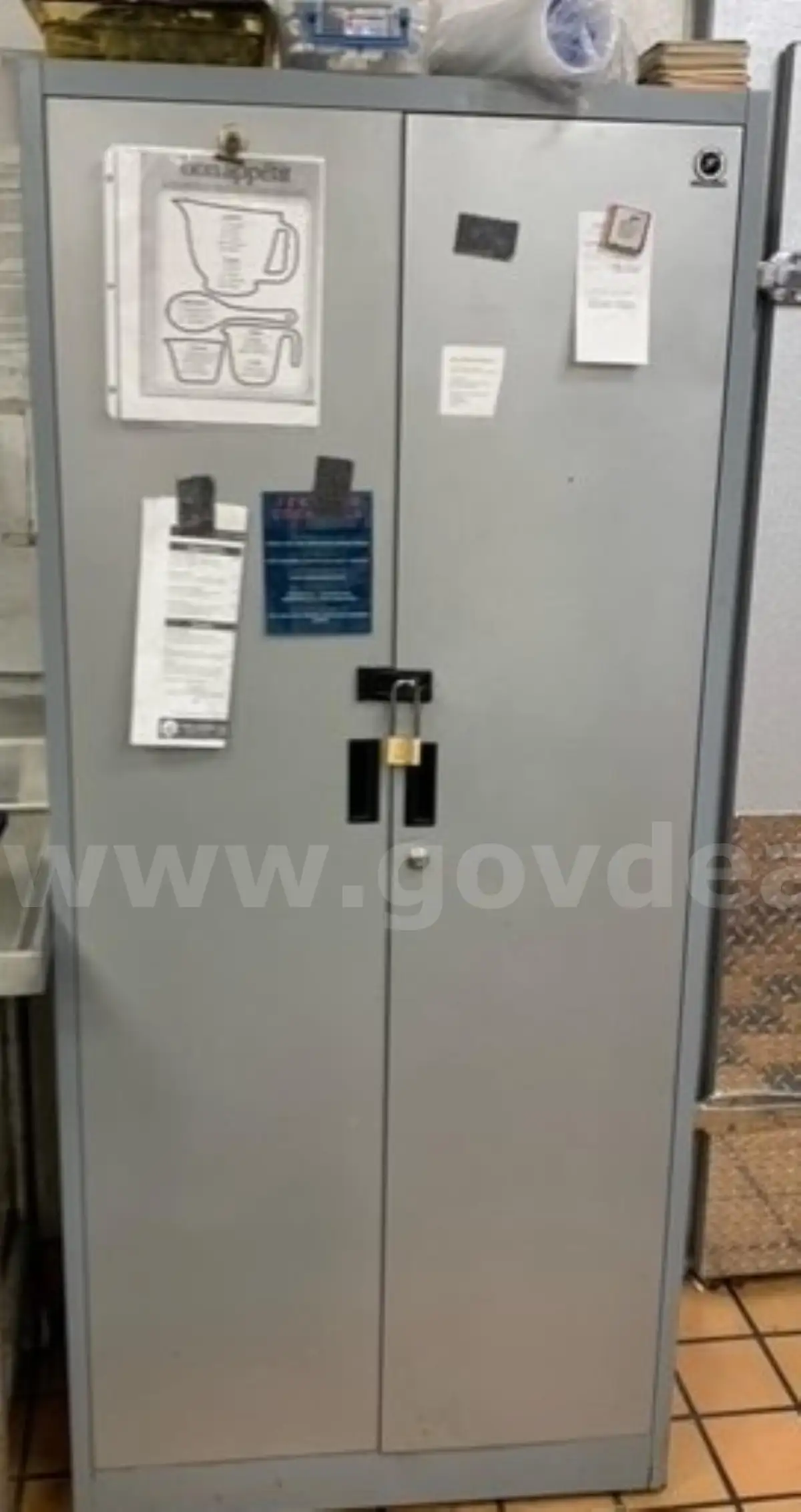 LOCKING LIQUOR CABINET | AllSurplus