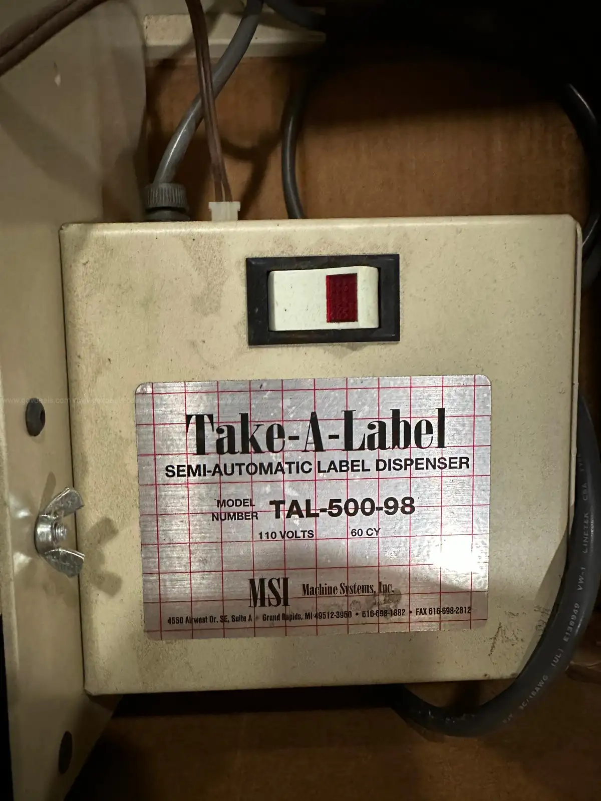 Take-A-Label semi-automatic label dispenser | AllSurplus