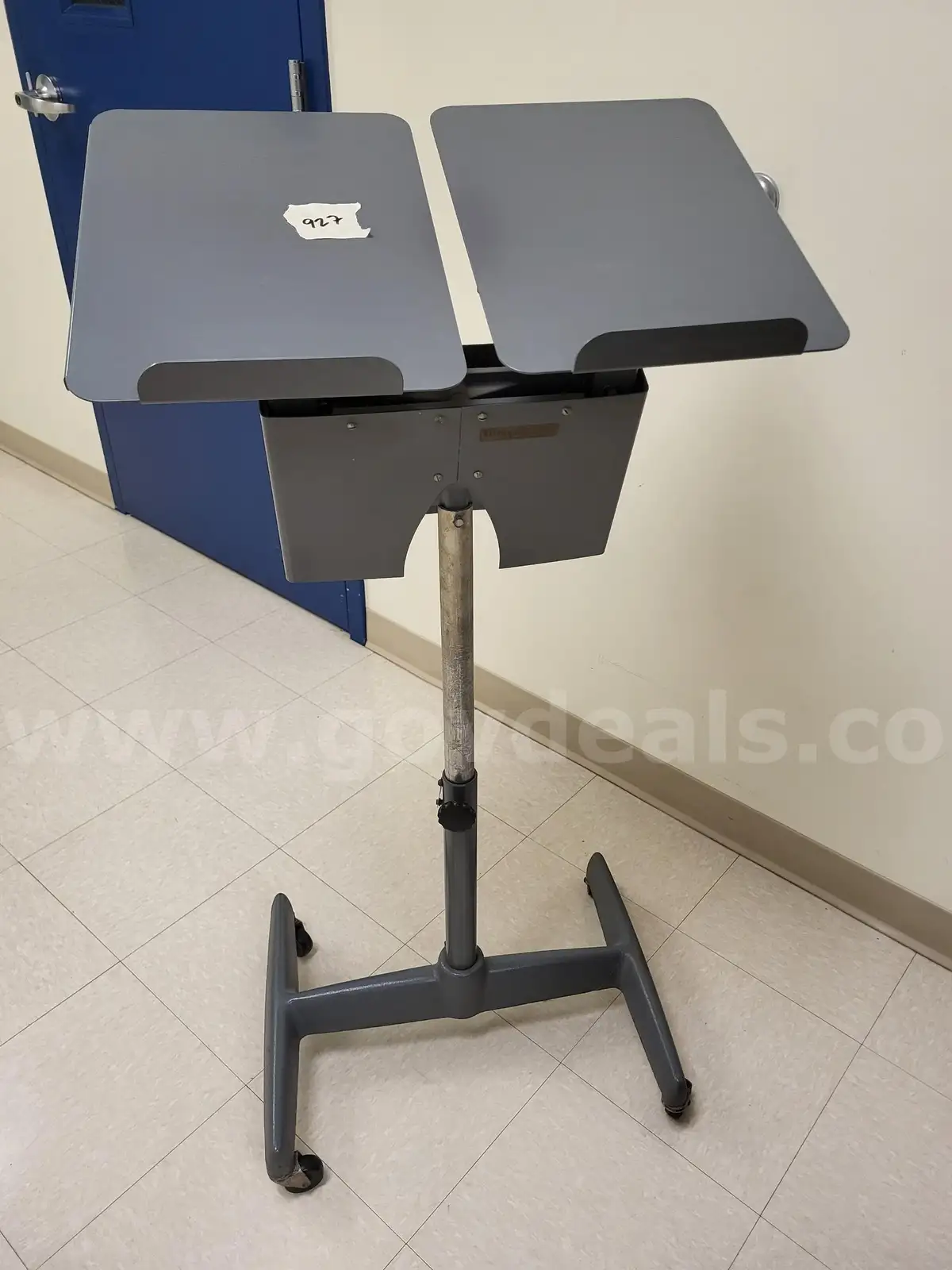 Gray Metal Rolling Podium | AllSurplus