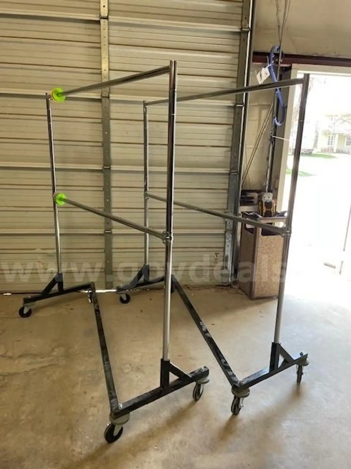 2 Uniform Rolling Racks | AllSurplus