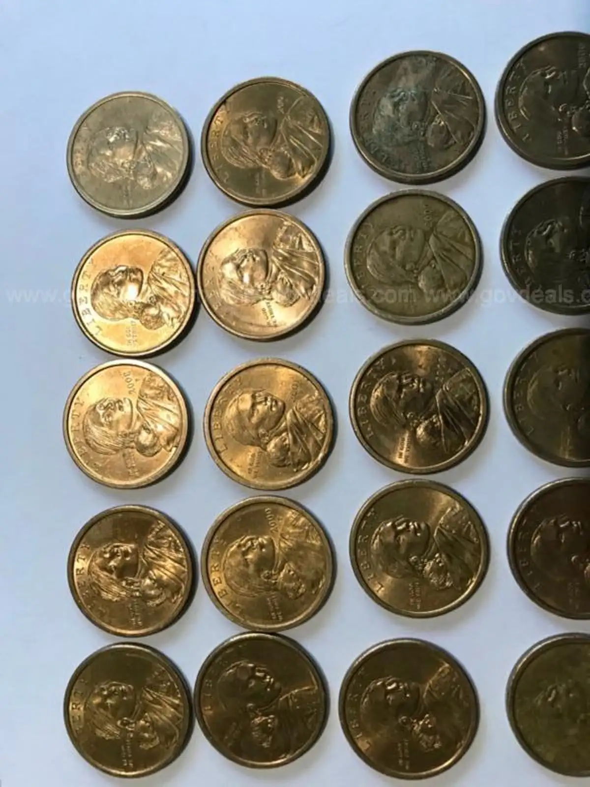 22 Sacajawea One Dollar gold colored coins and 3 President gold color ...