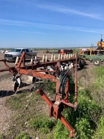 710 International 8 Bottom Plow and 12 Foot Leveler | GovDeals