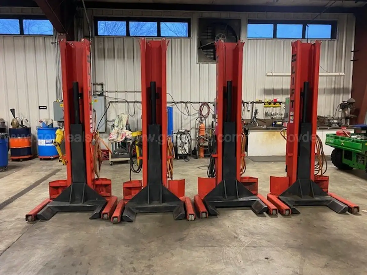 Four ALM 4 post portable lifts | GovDeals