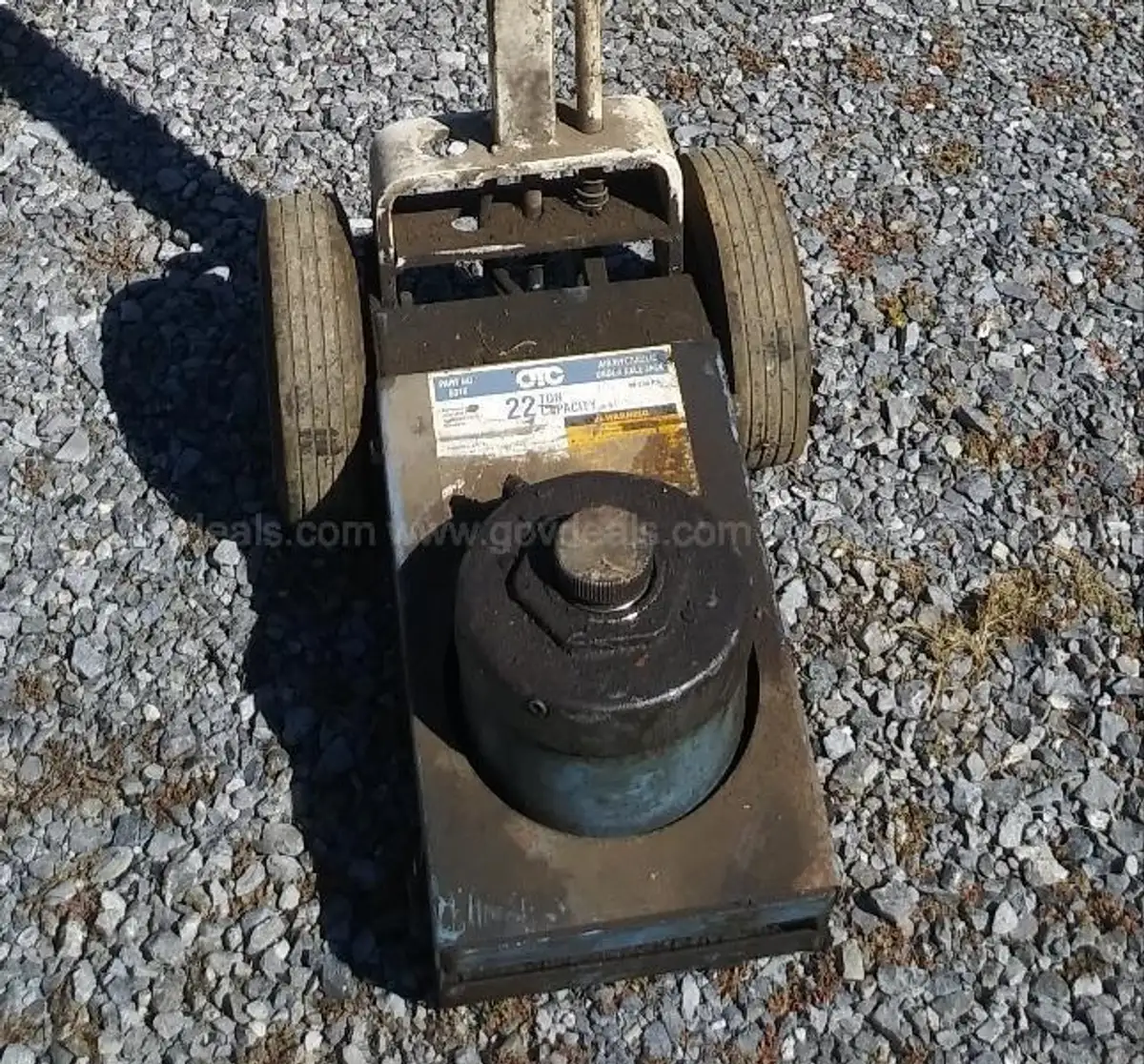 OTC Air/Hydraulic Under Axle Jack 22 Ton Capacity - Has a Hydraulic Leak | AllSurplus
