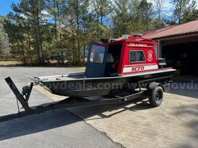 1 Lot of 2 Monark 18' Cabin Boats and Trailers | AllSurplus