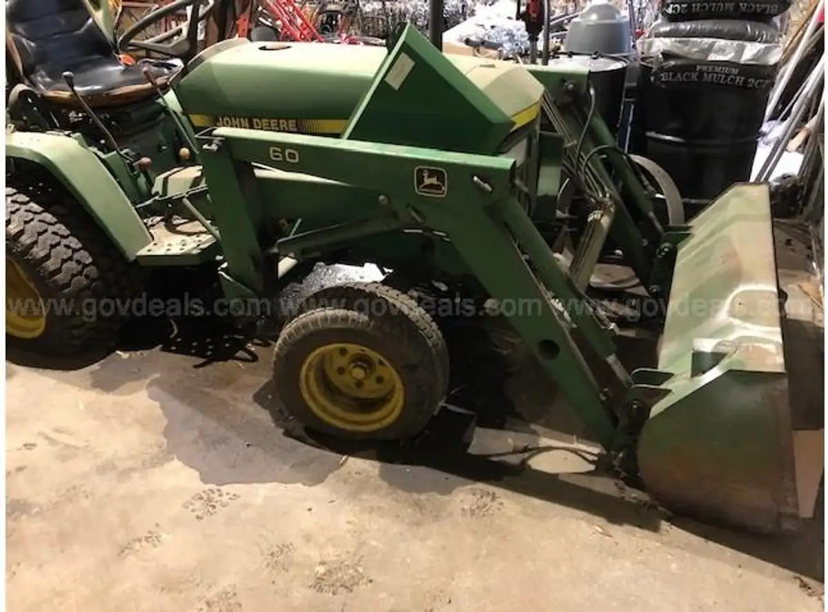670 John Deere Tractor with Front Loader and Rear Excavator | AllSurplus