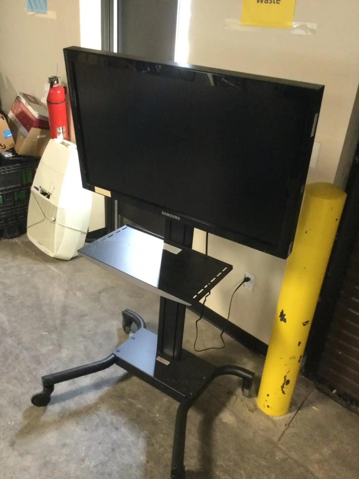 One (1) Samsung Television on a Rolling Carts | GovDeals