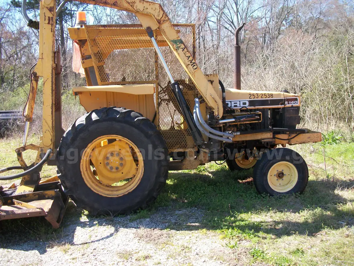 Ford 5640 Tractor with Alamo Boom Mower | GovDeals