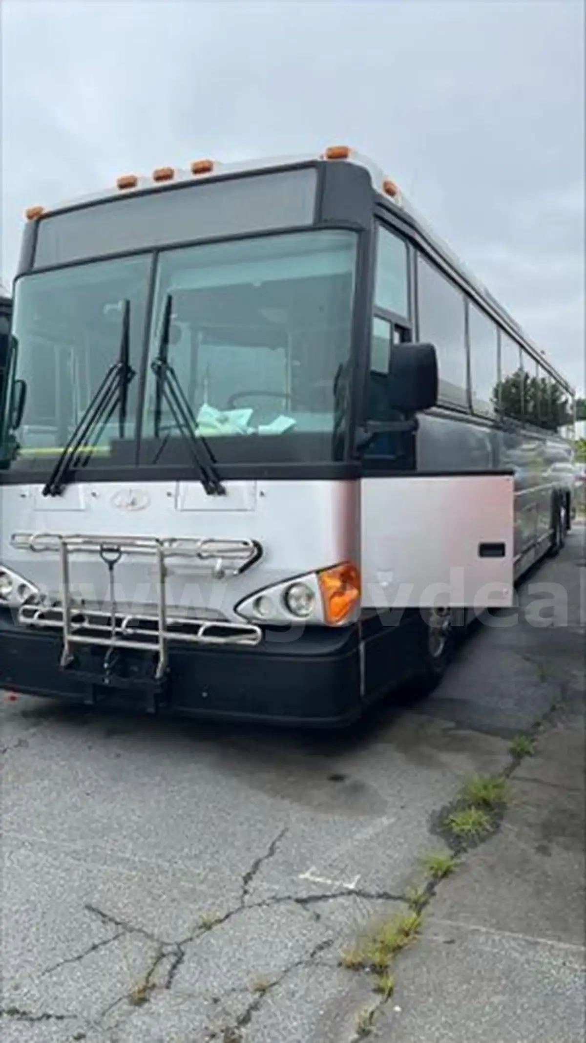 2004 MCI Transit Bus (204386 AJ) | AllSurplus