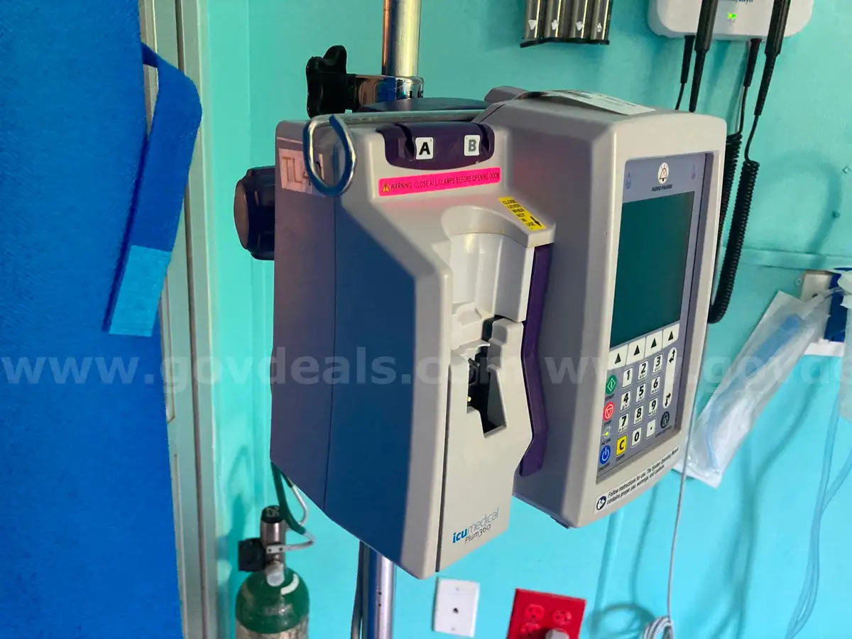 Lot of 5 ICU Medical Plum 360 Infusion Pumps - each on IV pole | AllSurplus
