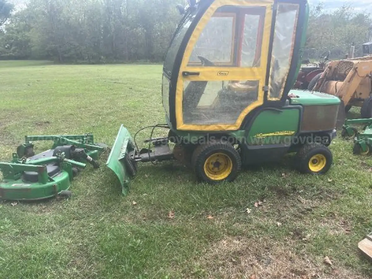 John Deere 1445 Mower with Cab, Front Mower Deck and Snow Blade. | GovDeals