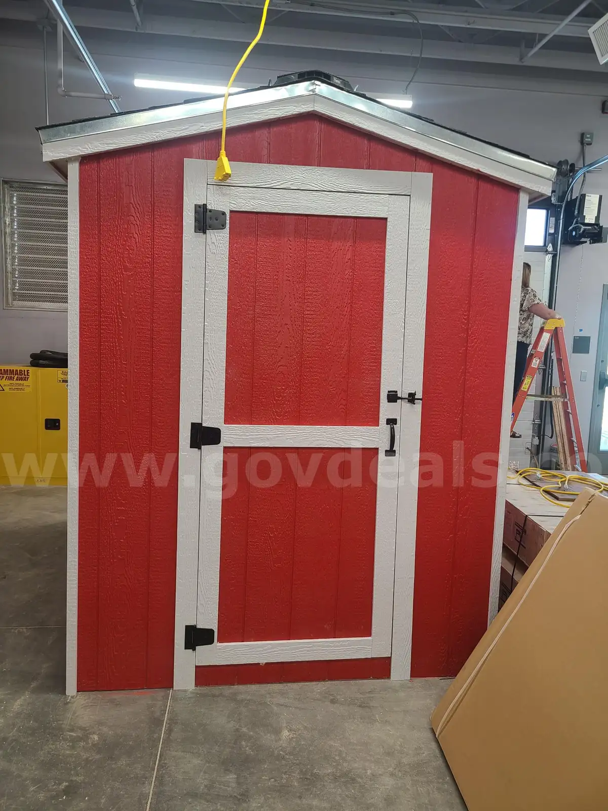 1 UNM Red Wooden Shed | AllSurplus