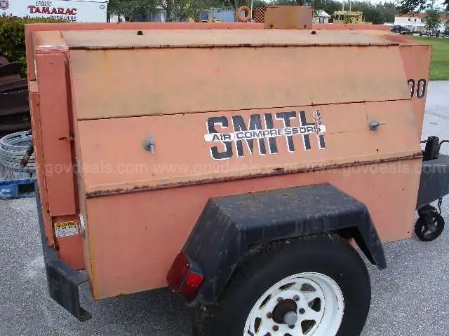 Smith portable Air Compressor w/ Ford CSG-8501-6005A Engine. | GovDeals