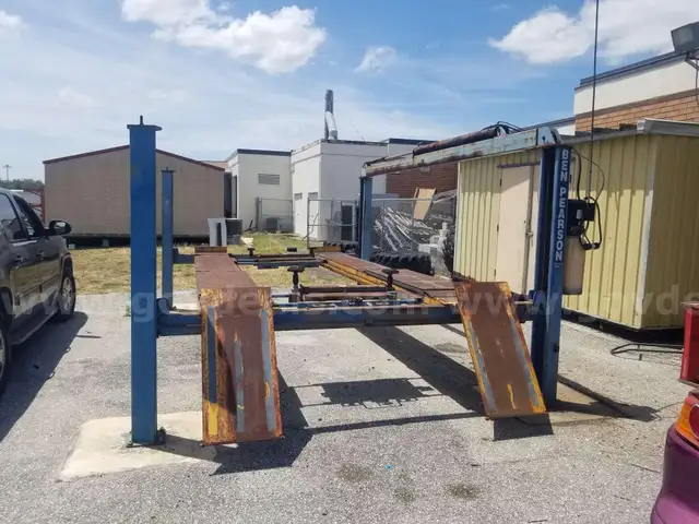 Ben Pearson 4 Post Hydraulic Lift | AllSurplus