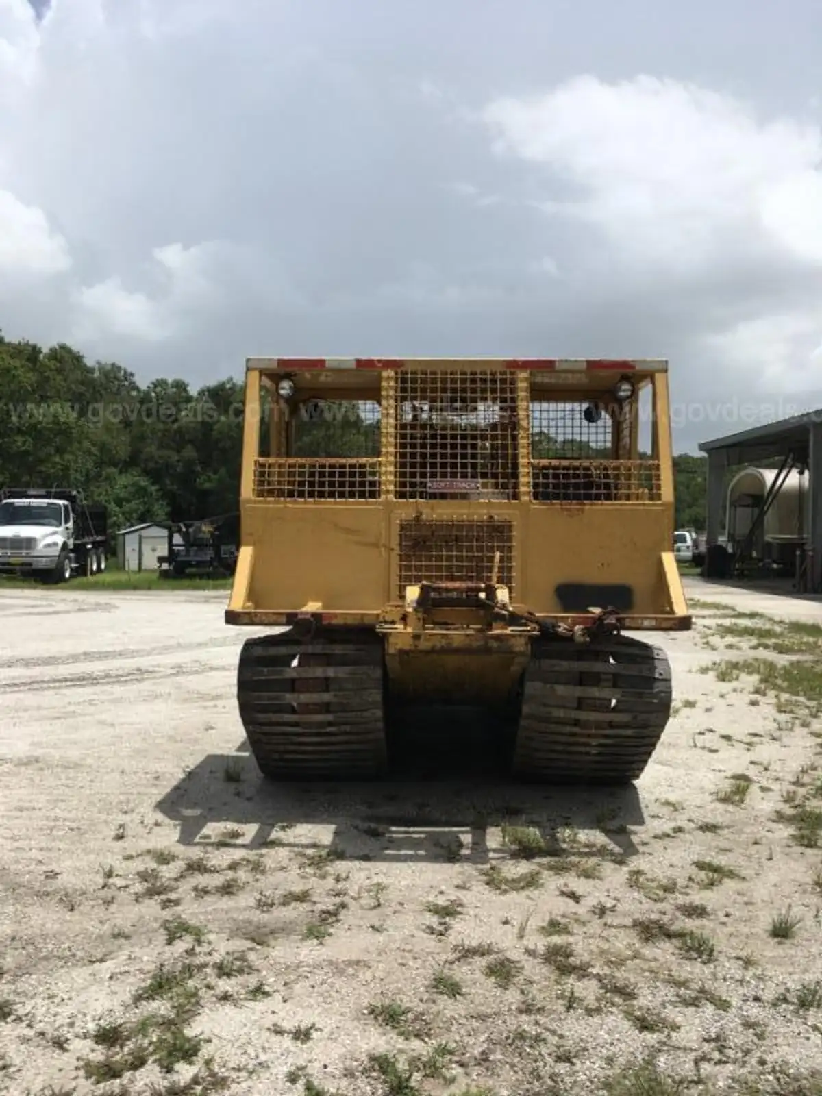 2000 Bombardier Soft Track 6 Cyl., with custom built Poly tank | AllSurplus