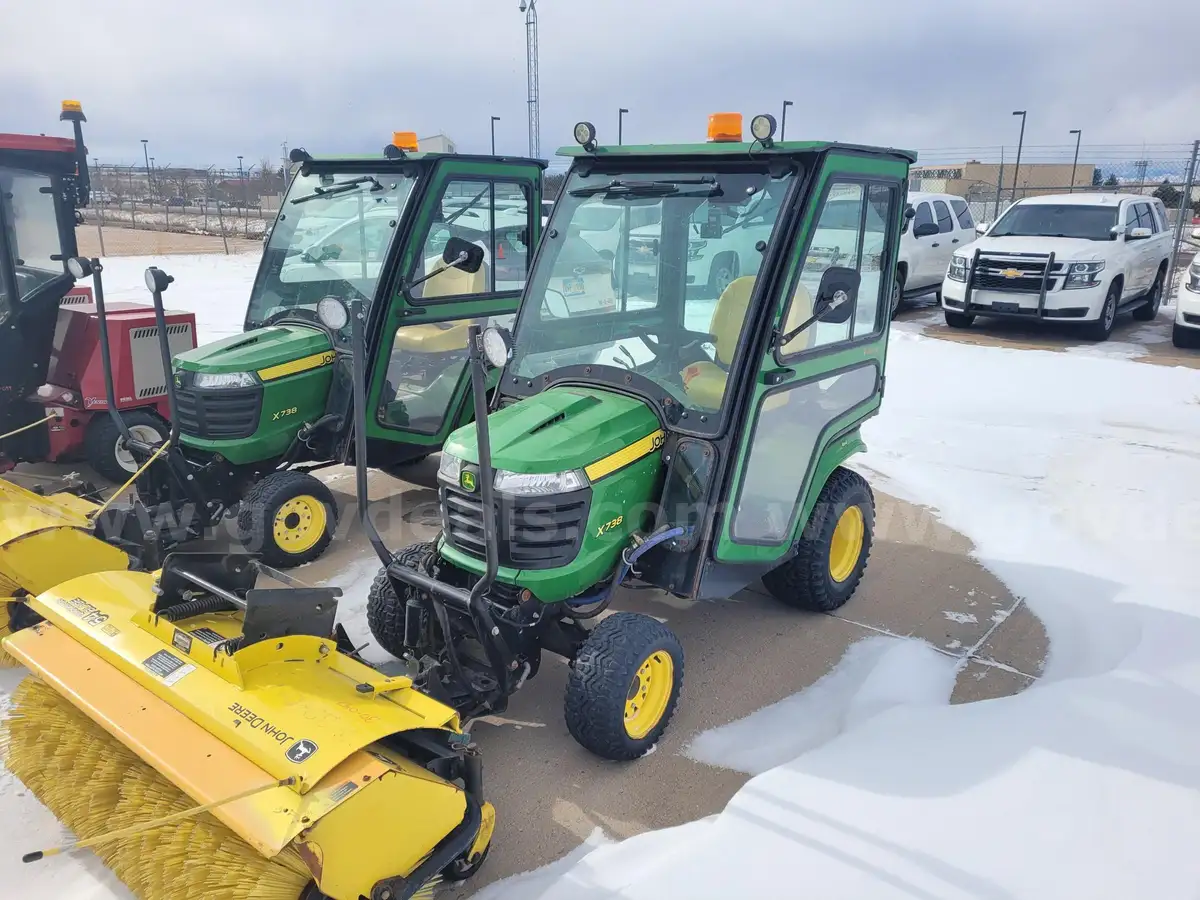 2016 John Deere X738 4WD Tractor w/ Cab, Plow and Broom | AllSurplus