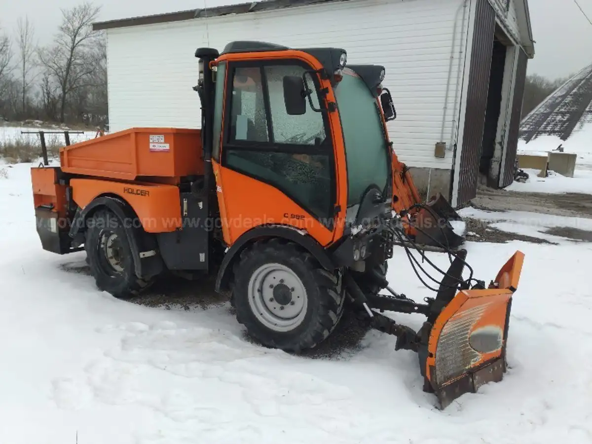 2012 Holder C992 Sidewalk Tractor and Attachments | GovDeals
